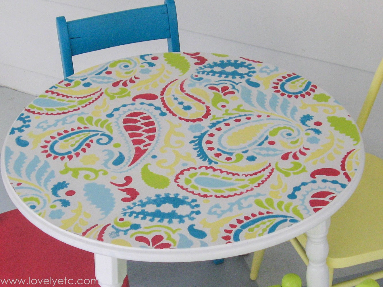 Colorful painted child's table and chairs