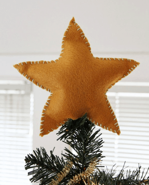 25 Fun & Unique Christmas Tree Topper Ideas