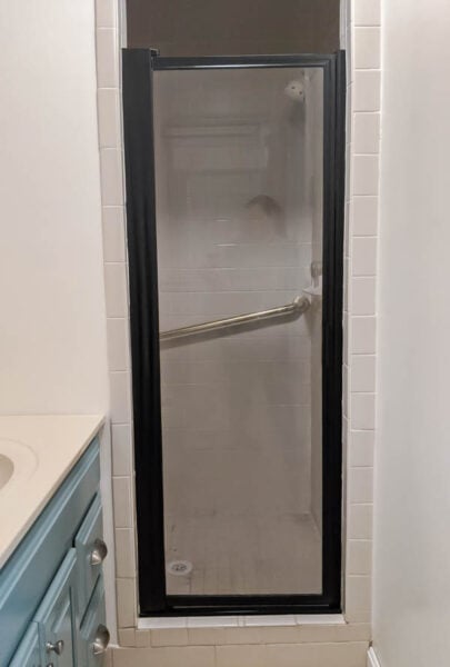 How to Paint a Shower Door Frame on the Cheap - Lovely Etc.
