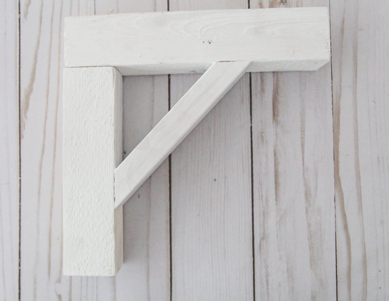 How to Make Cheap and Easy DIY Shelf Brackets - Lovely Etc.