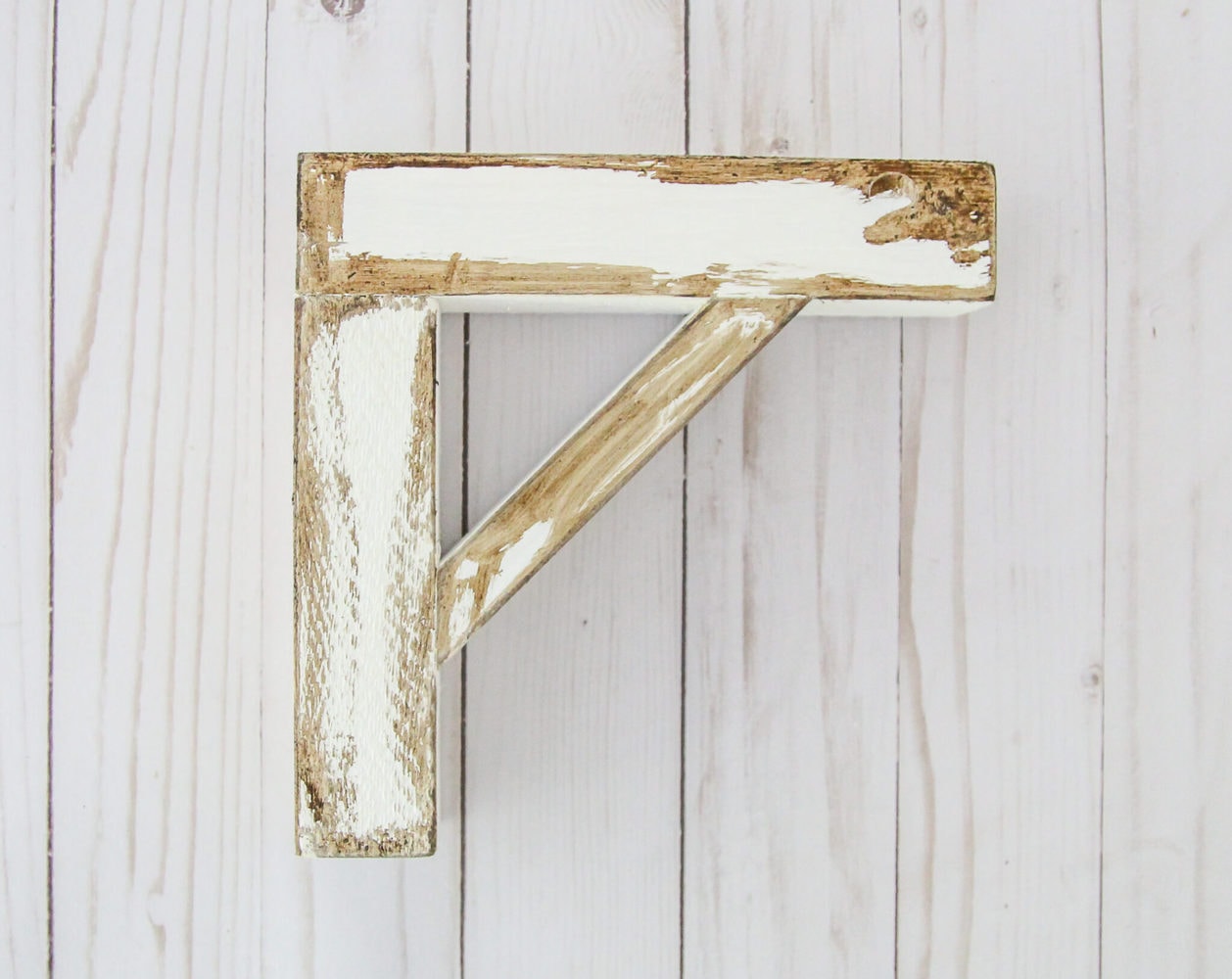 How to Make Cheap and Easy DIY Shelf Brackets - Lovely Etc.