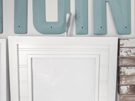 7 Genius Picture Hanging Hacks to Make Hanging Art Easier - Lovely Etc.