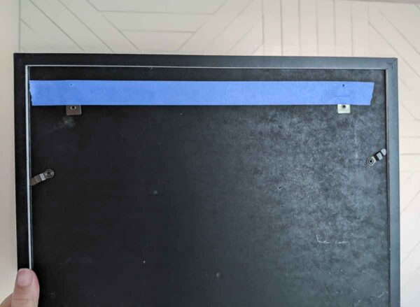 7 Genius Picture Hanging Hacks to Make Hanging Art Easier - Lovely Etc.