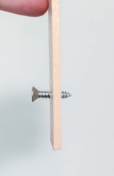 7 Genius Picture Hanging Hacks to Make Hanging Art Easier - Lovely Etc.