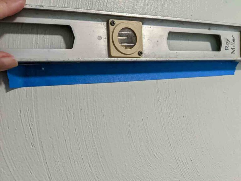 7 Genius Picture Hanging Hacks to Make Hanging Art Easier - Lovely Etc.